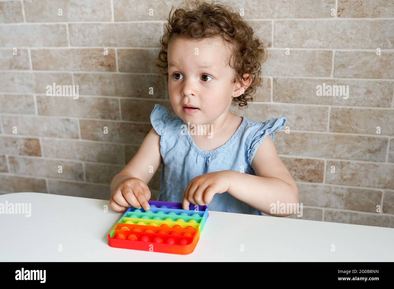 Fine motor skills hi-res stock photography and images - Alamy