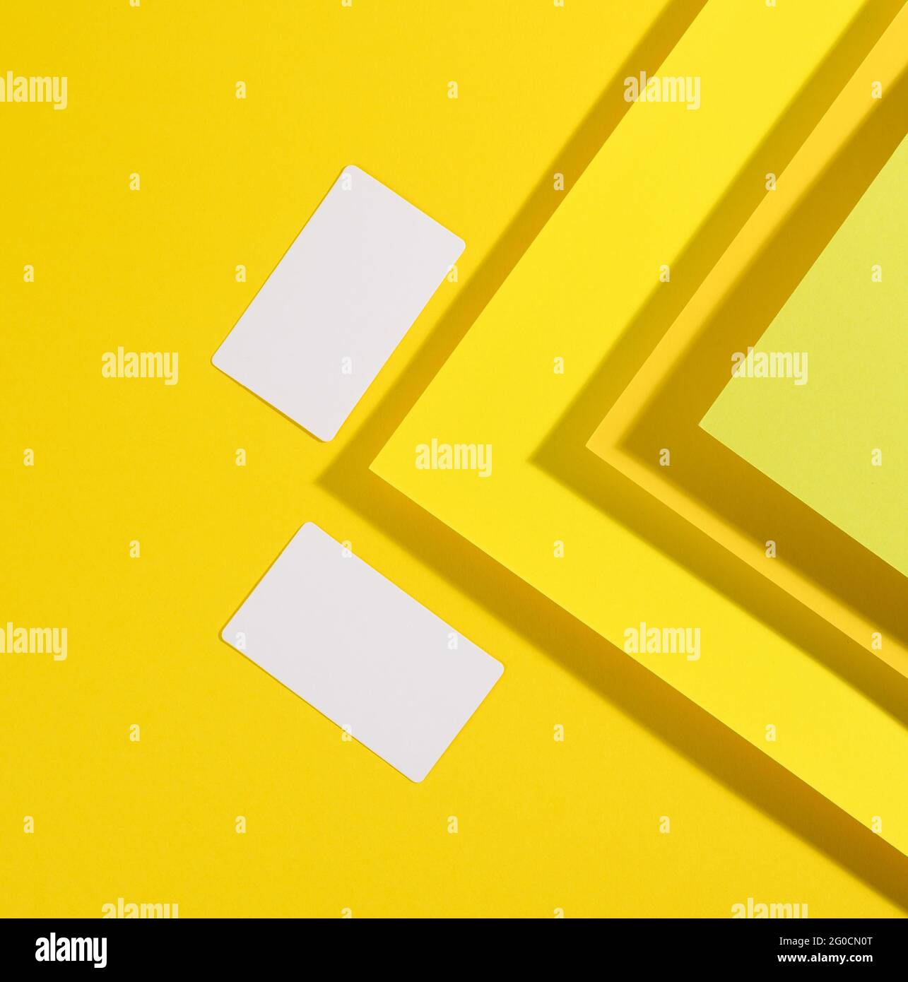 blank white rectangular business card on creative yellow background ...