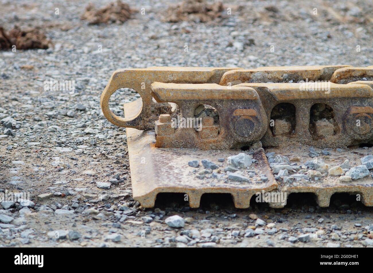 Broken track of a construction machine Stock Photo - Alamy