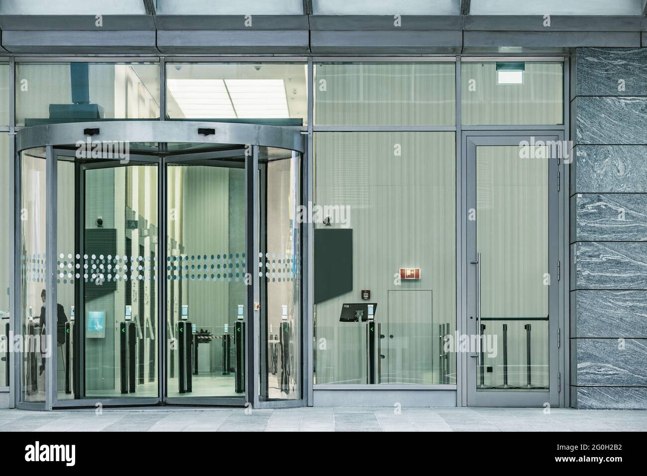 Entrance of the modern business city office building Stock Photo - Alamy