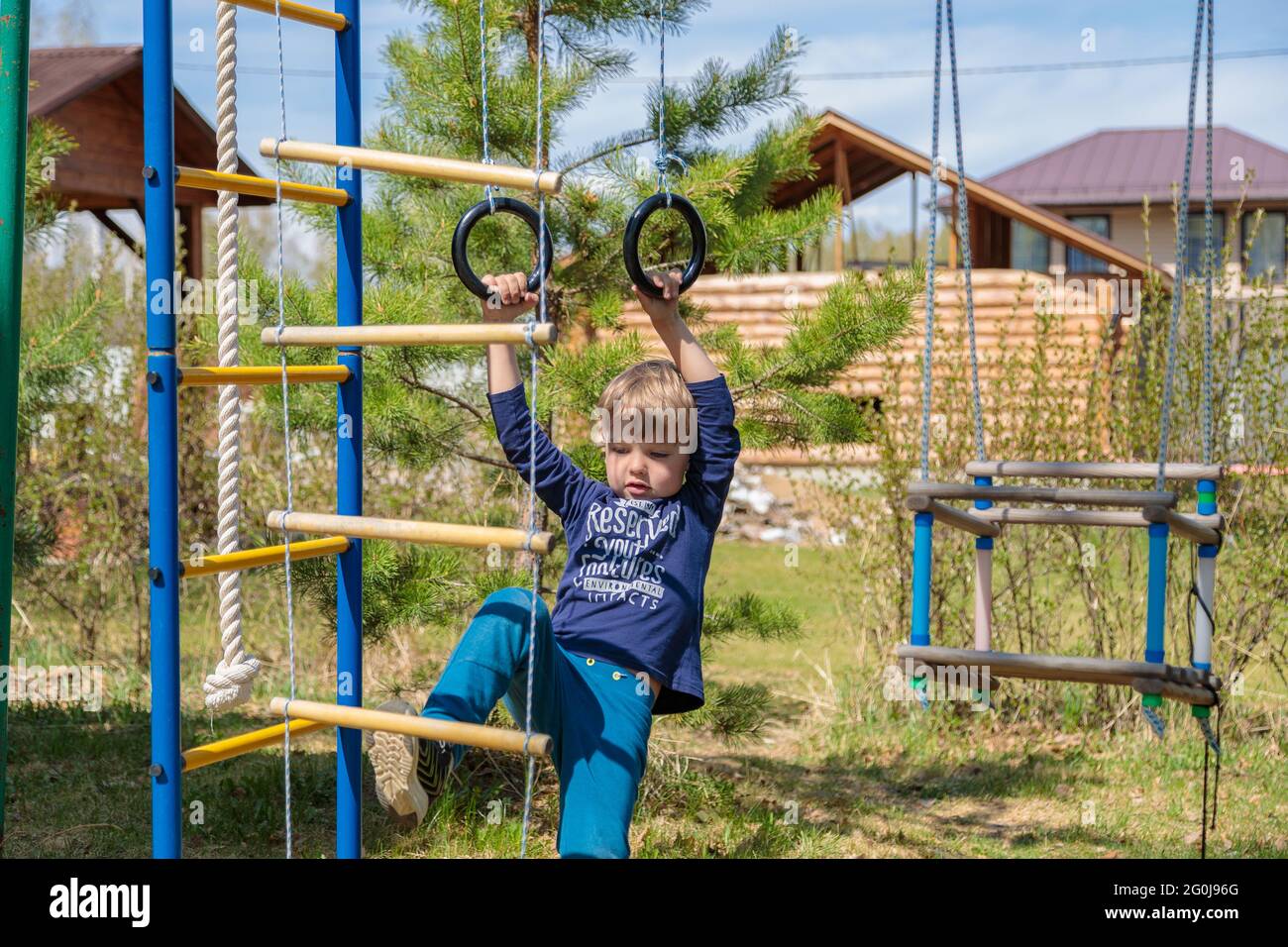 Child playground rings hi-res stock photography and images - Alamy