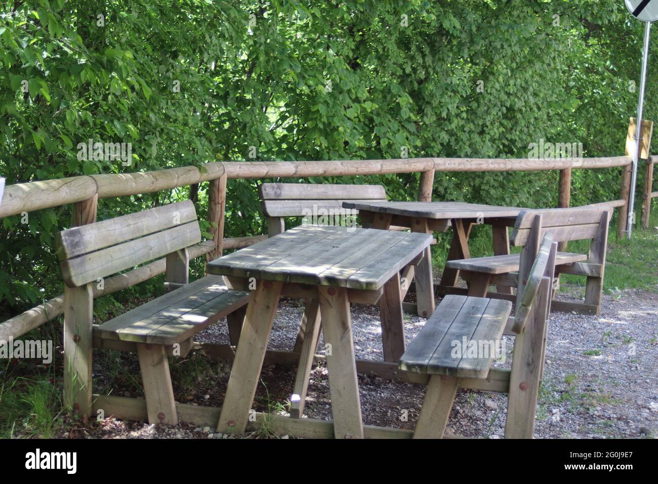Closeup shot of wooden park benches and tables Stock Photo - Alamy