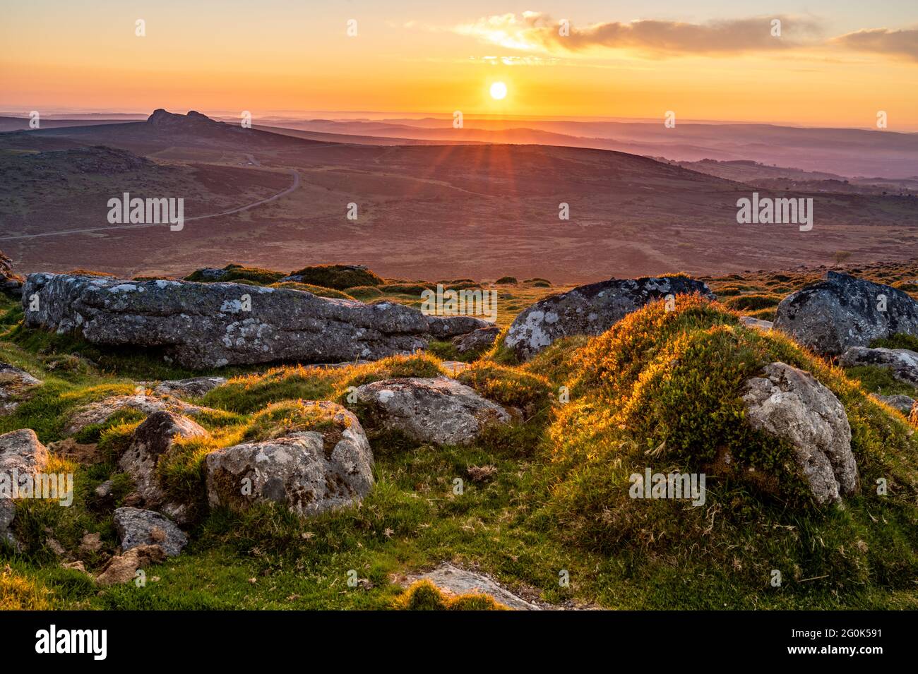 Morning light as the sun shines on Rippon Tor, Dartmoor Stock Photo - Alamy