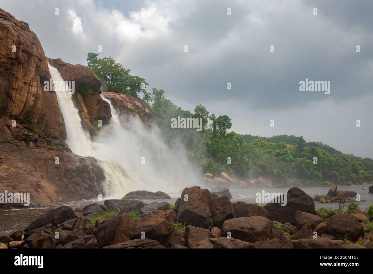 This is the athirapally waterfall falling from hill top latest image ...