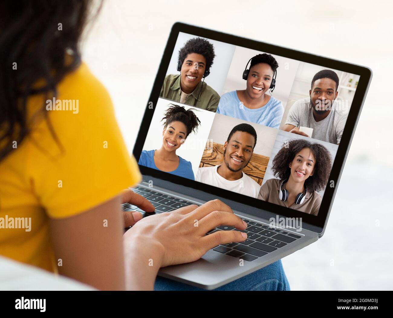 Family involved in group video call distant communication Stock Photo ...