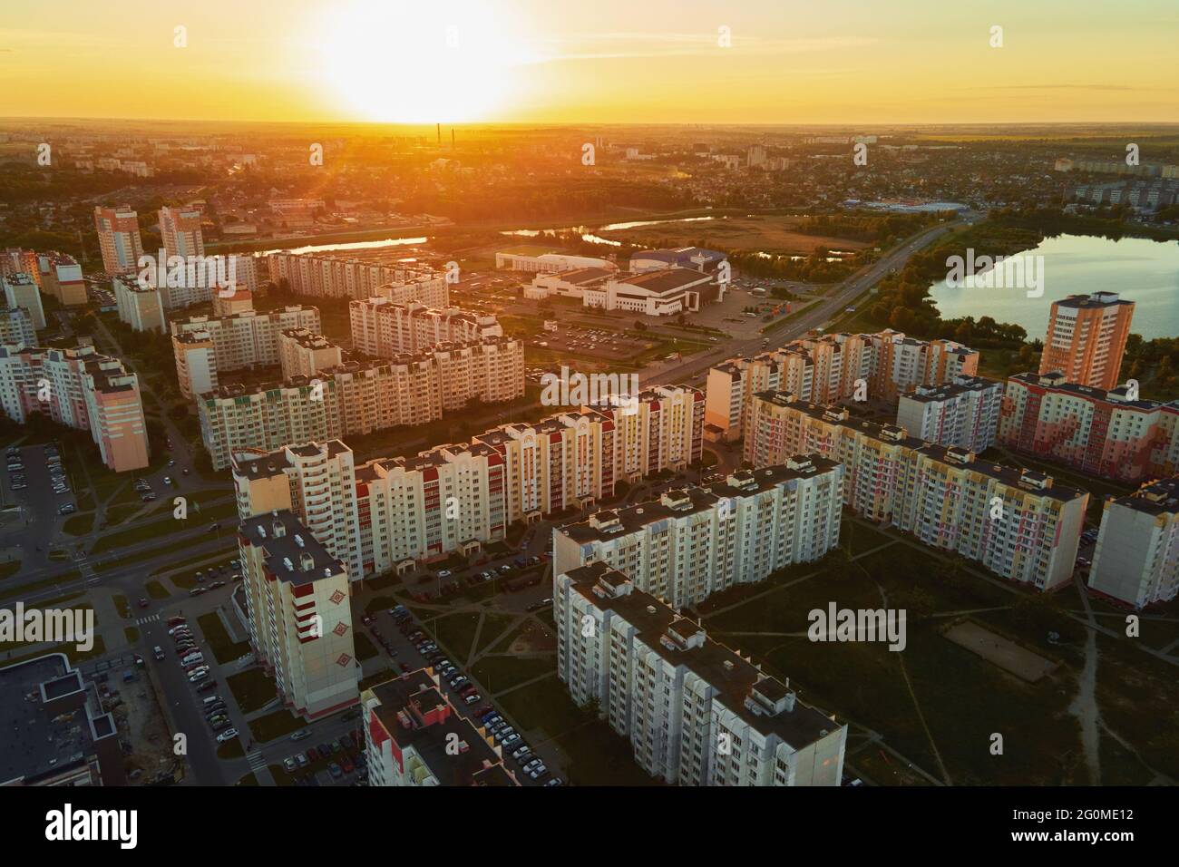 Cityscape of Gomel, Belarus. Aerial view of town architecture. City streets at sunset, bird eye ...