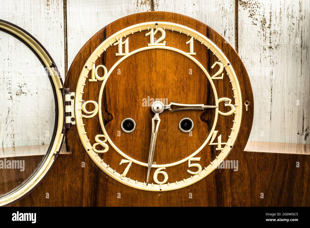 Old vintage clock on wooden wall background. Time concept Stock Photo ...