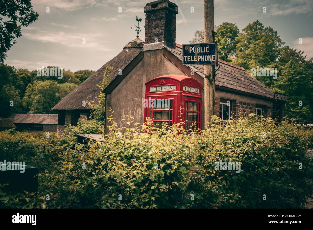Old British public telephone box and small post office. A snapshot of ...