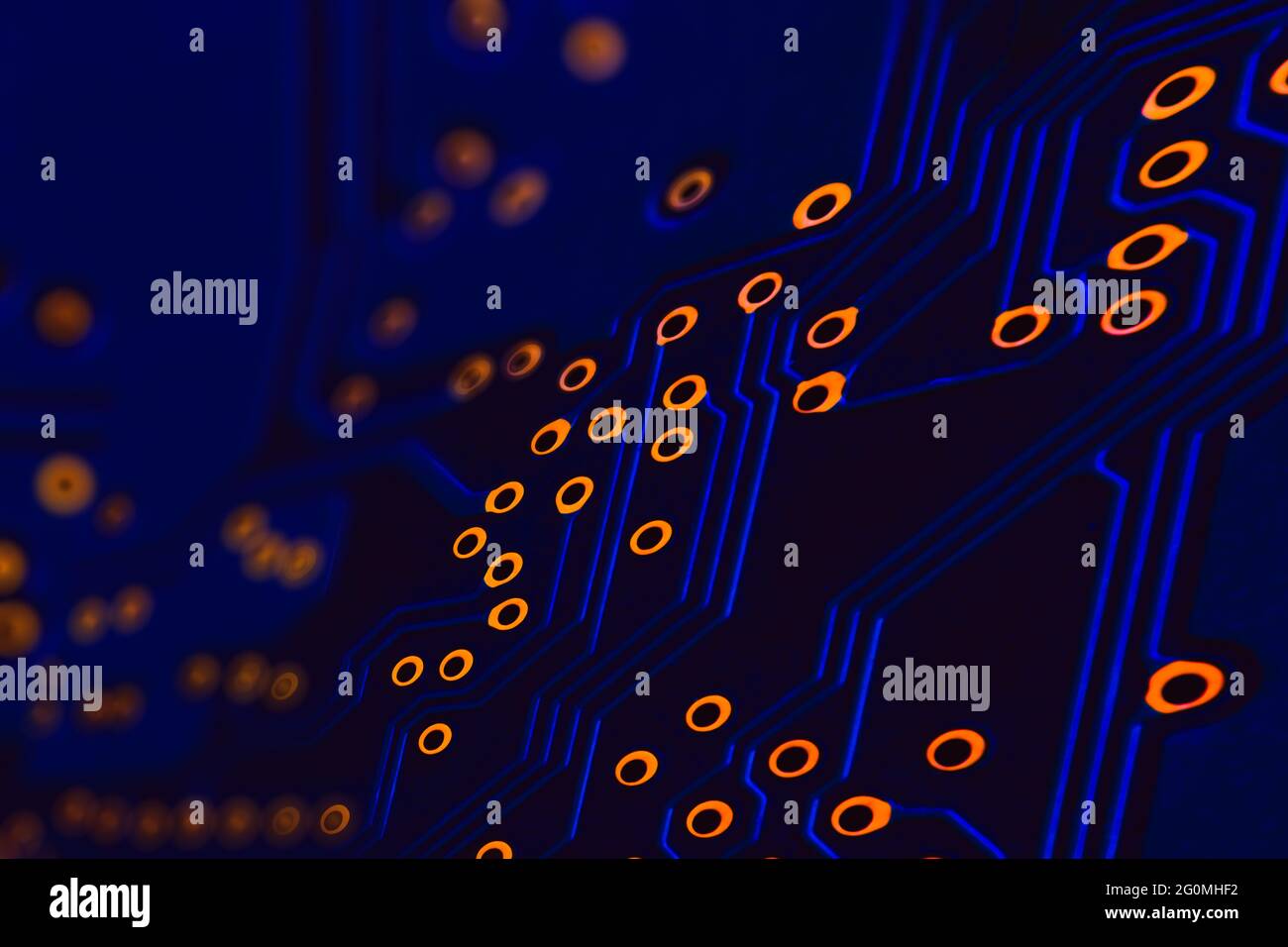 Stylized circuit board with indigo and gold highlights Stock Photo - Alamy