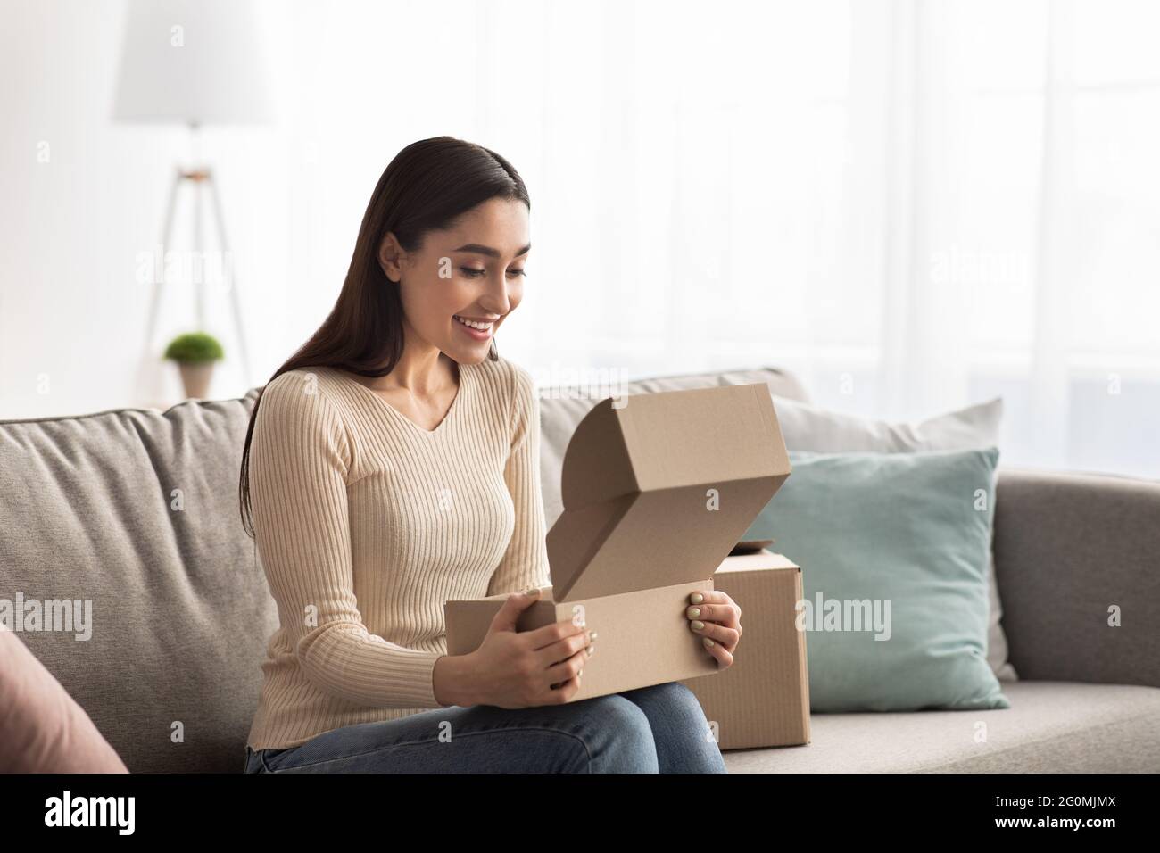 Satisfied client received online store order, good quick delivery service Stock Photo - Alamy