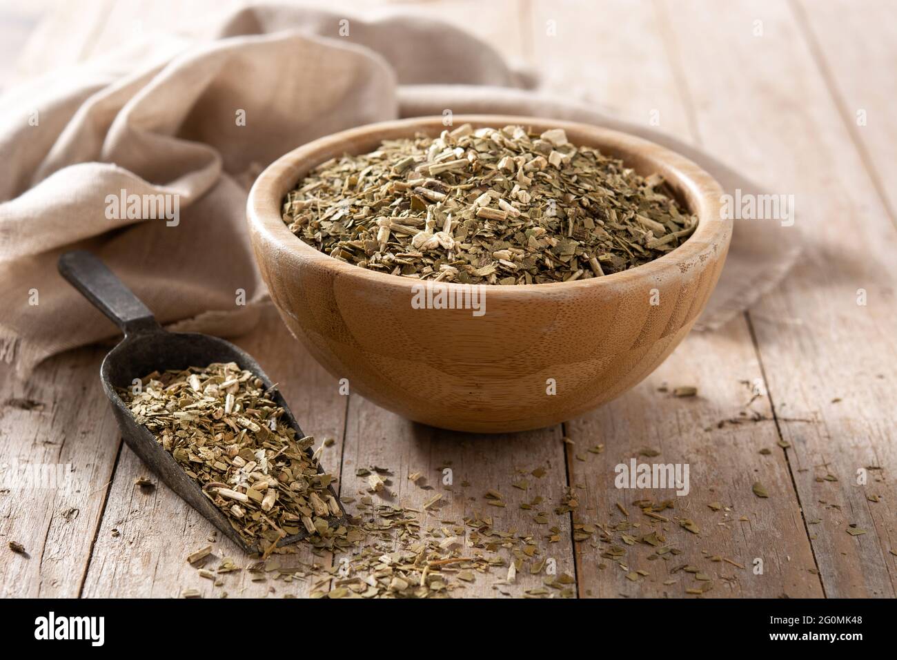 Traditional yerba mate tea in bowl on wooden table Stock Photo - Alamy