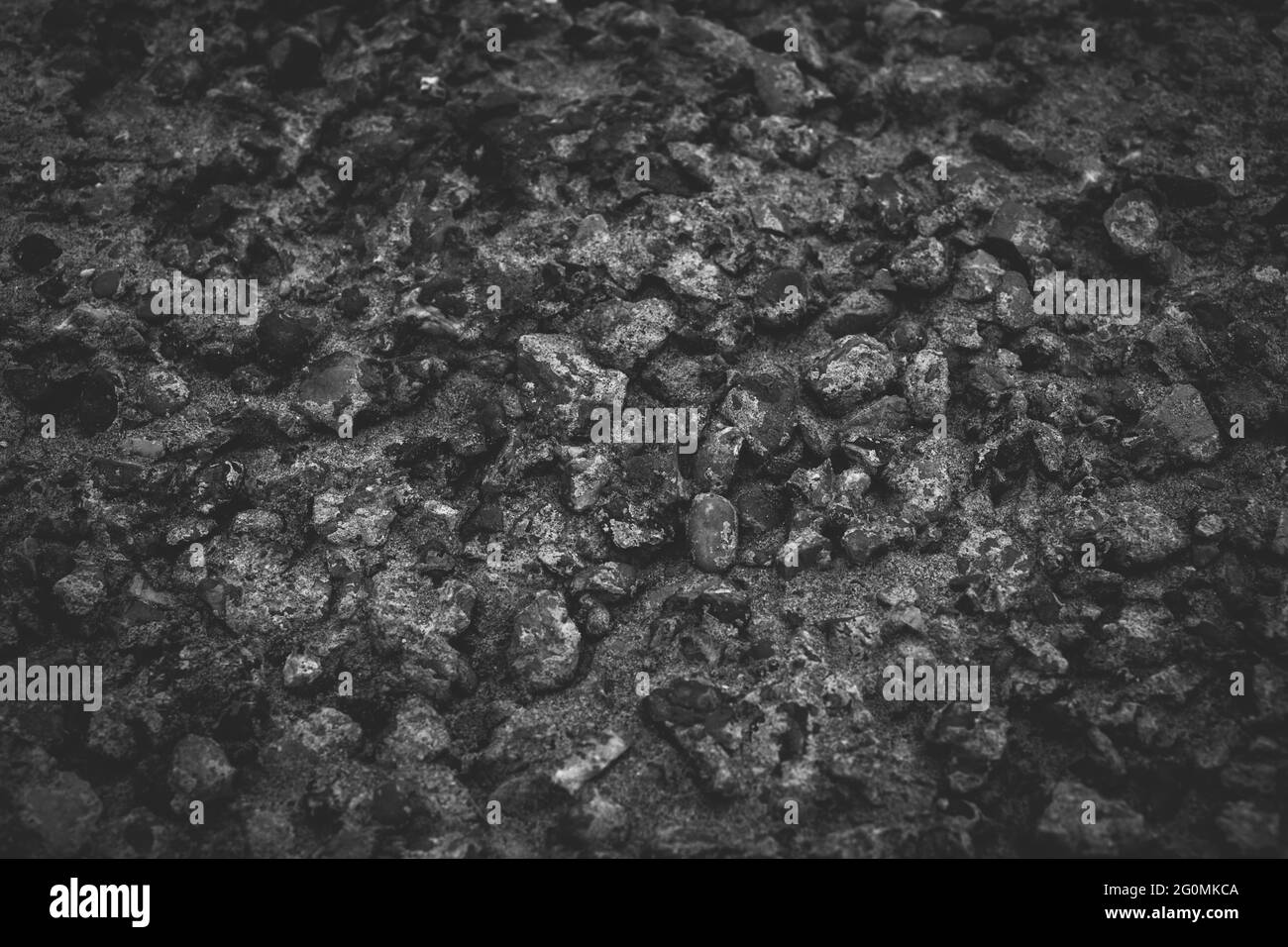 Closeup of dark rock textured background. Gray rough stone texture and ...