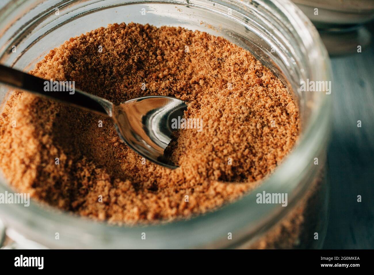 Panela sugar background. Close up view of raw cane sugar in a jar Stock ...