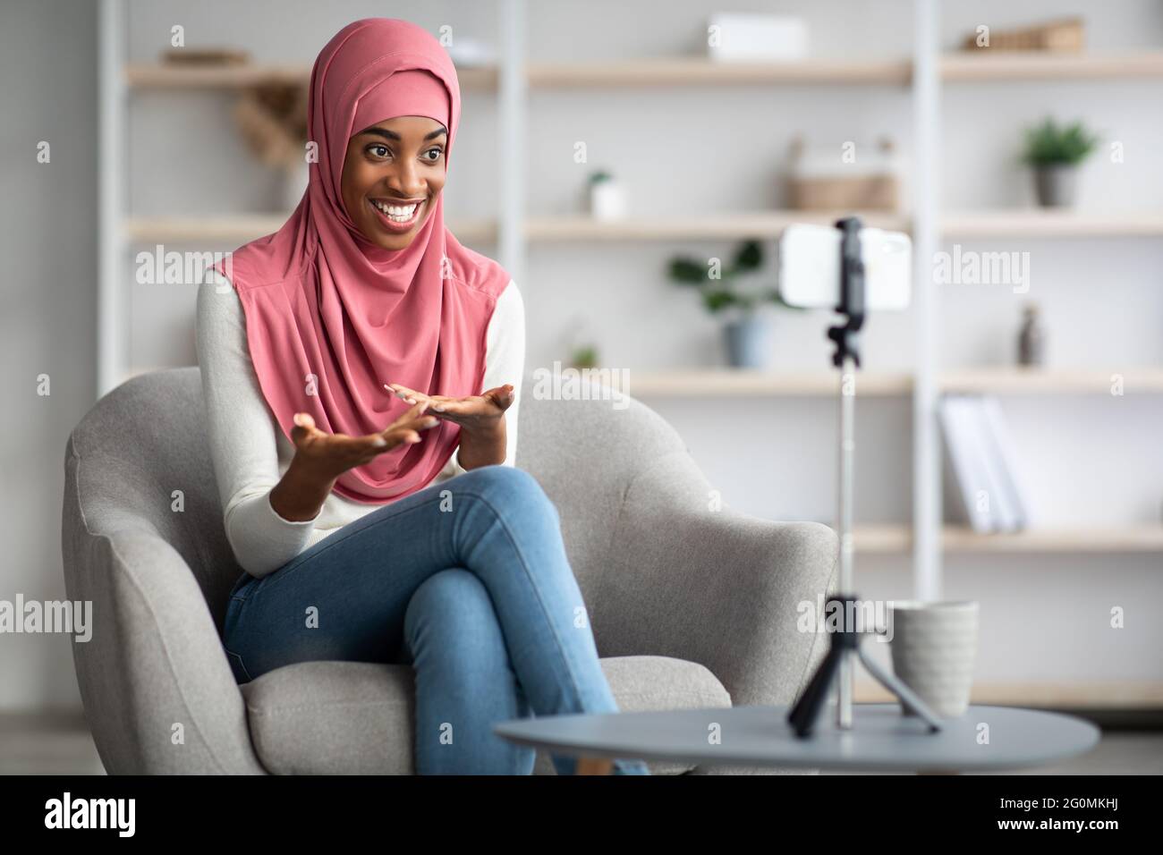 Modern Blogging Concept. Black Muslim Lady In Hijab Recording Video At ...