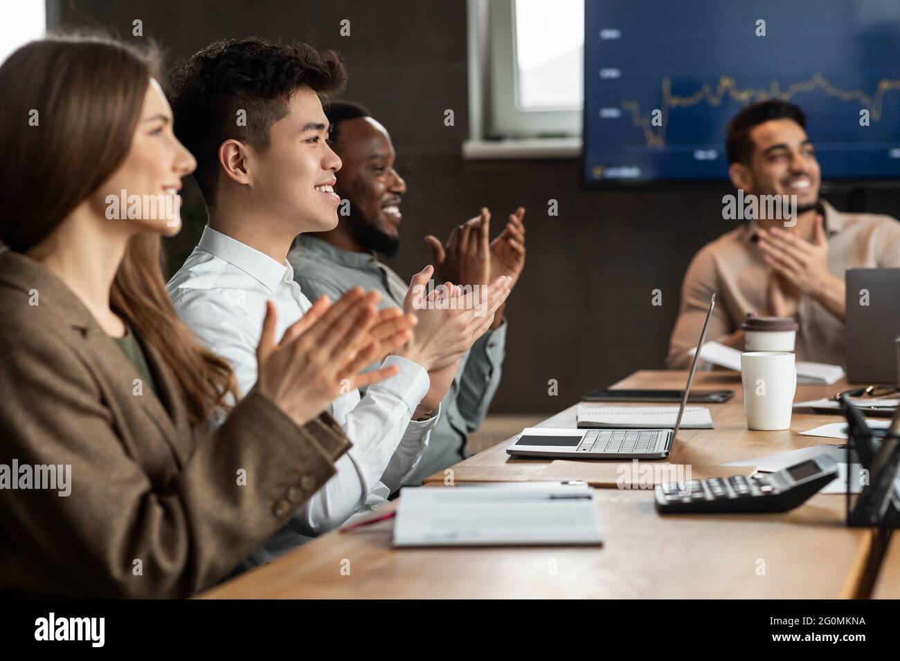 Successful Meeting. Colleagues having training in boardroom, clapping ...