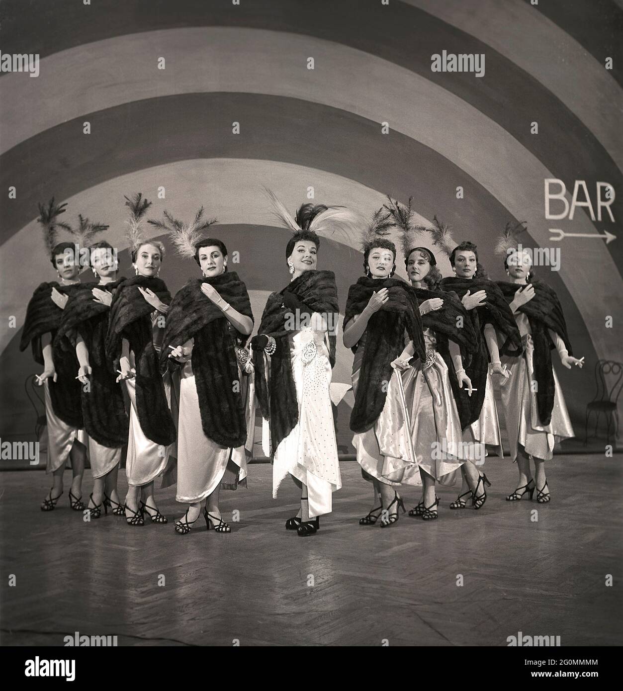 Ballet girls in on stage in the 1950s. The young women are all dressed ...