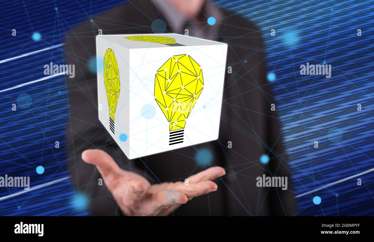 Innovation concept above the hand of a man in background Stock Photo ...