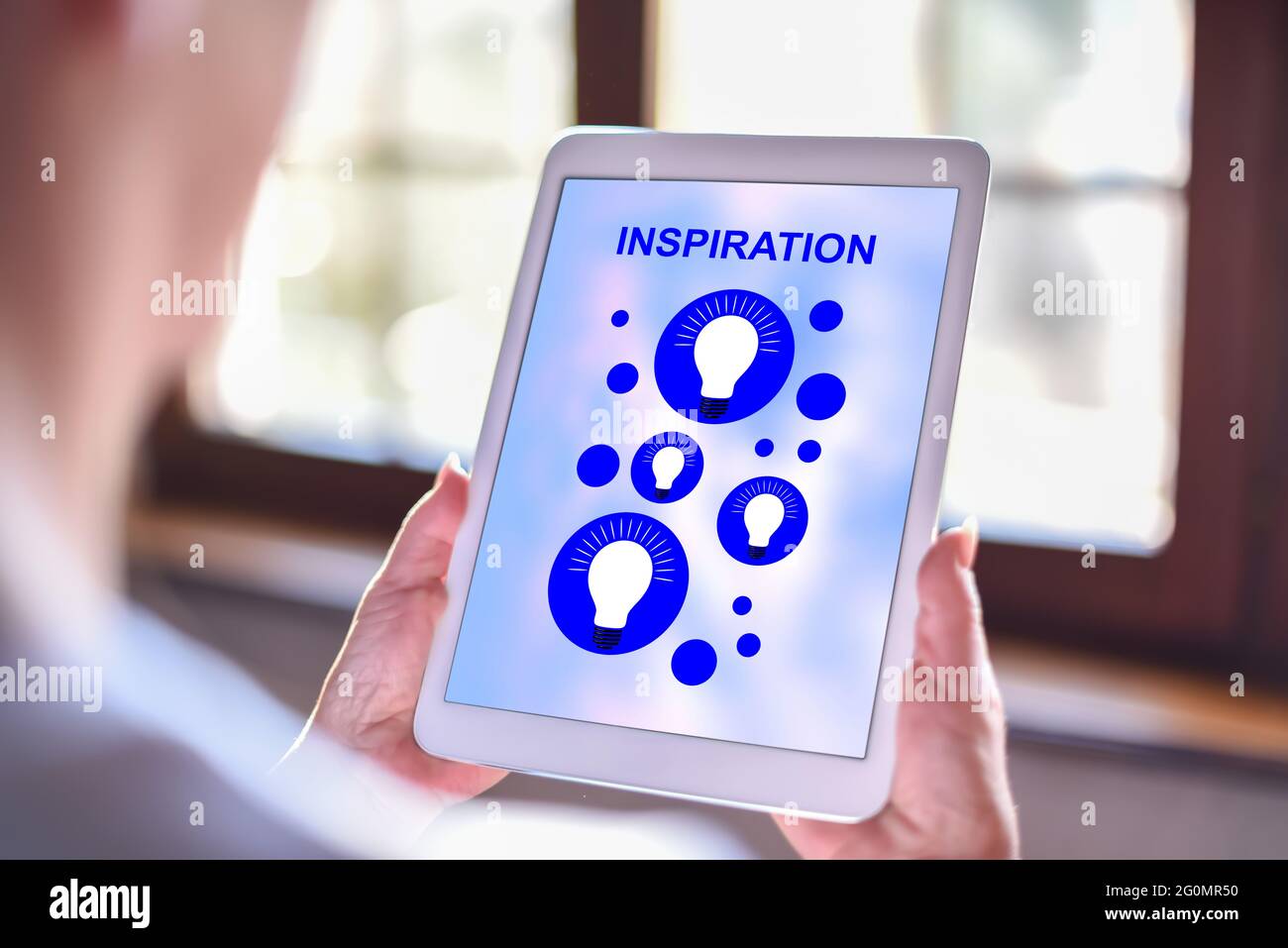Tablet screen displaying an inspiration concept Stock Photo - Alamy