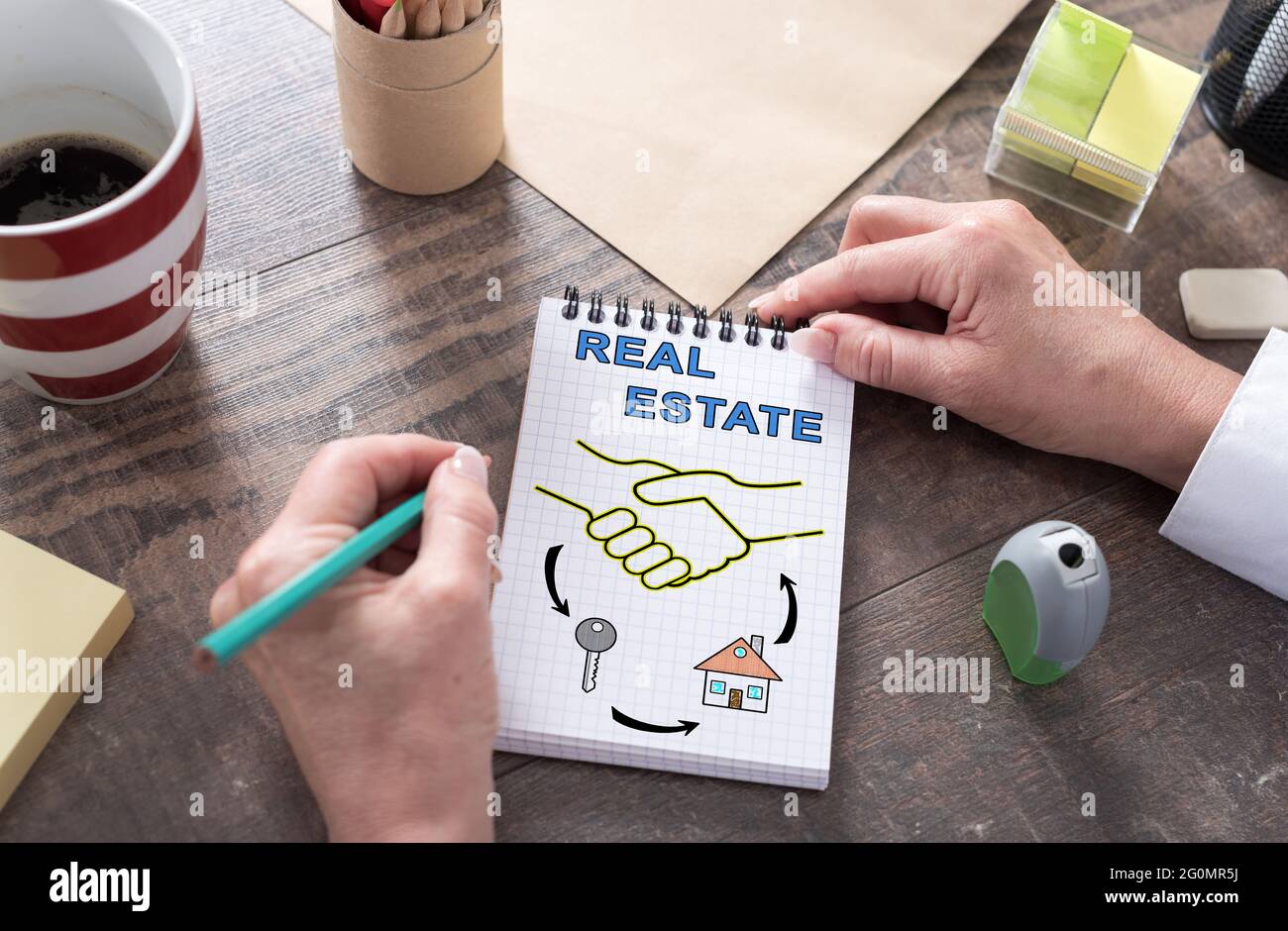 Concept of real estate drawn on a notepad Stock Photo - Alamy