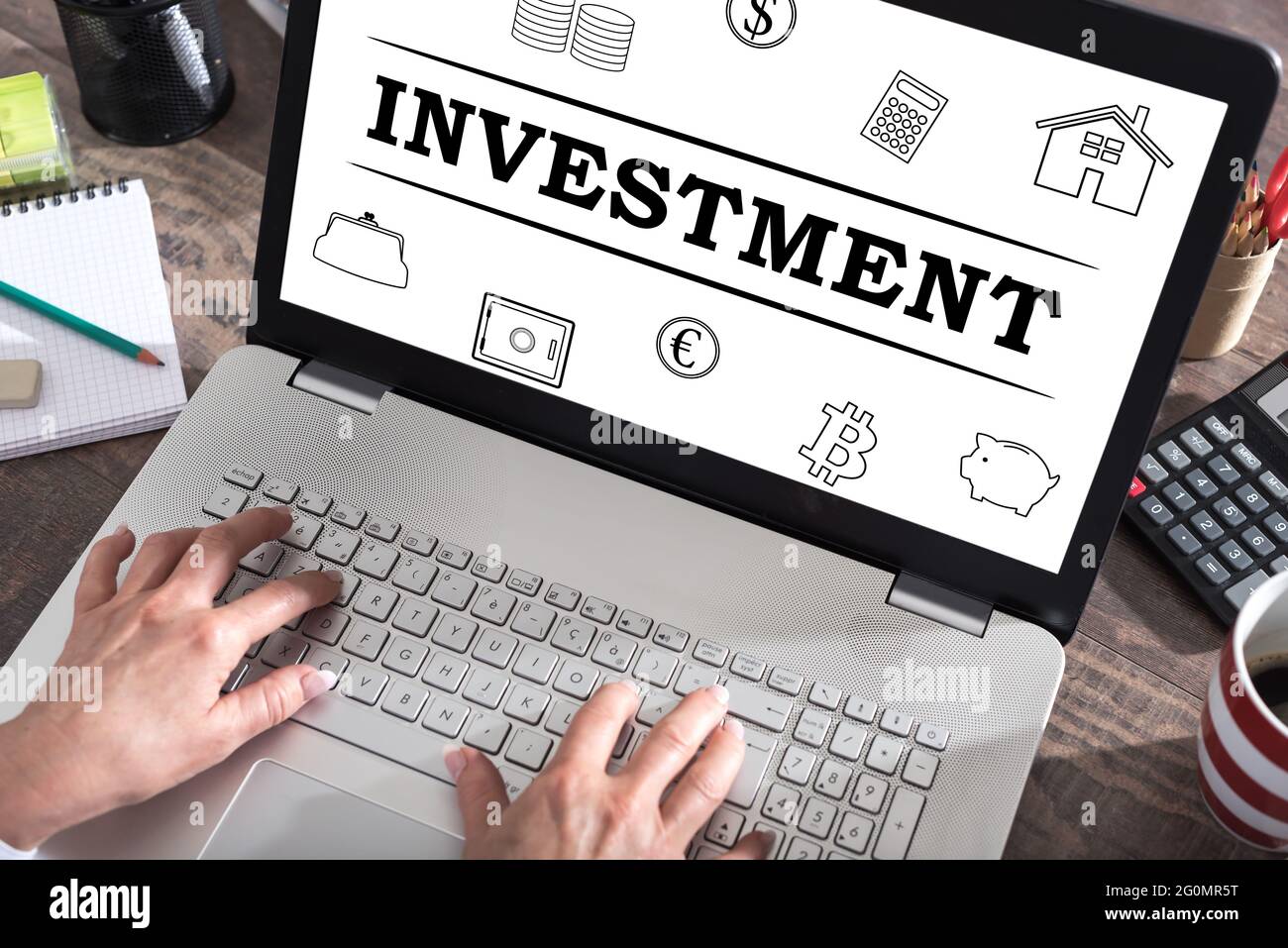Investment concept shown on a laptop screen Stock Photo - Alamy
