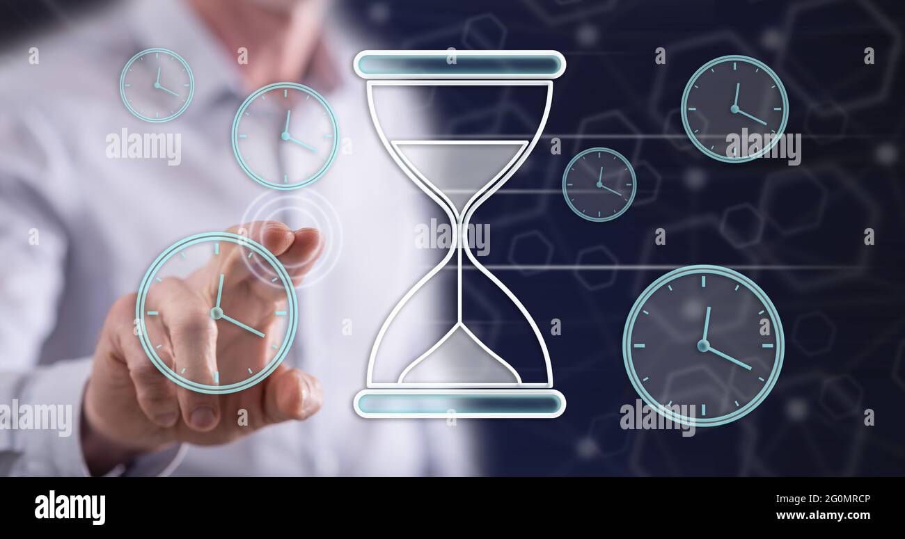 Man touching a time management concept on a touch screen with his ...