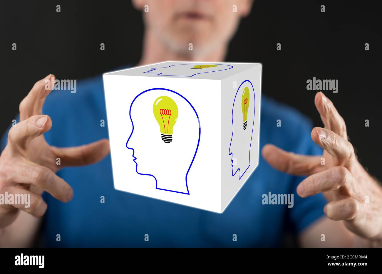 Human brain ideas concept between hands of a man in background Stock ...