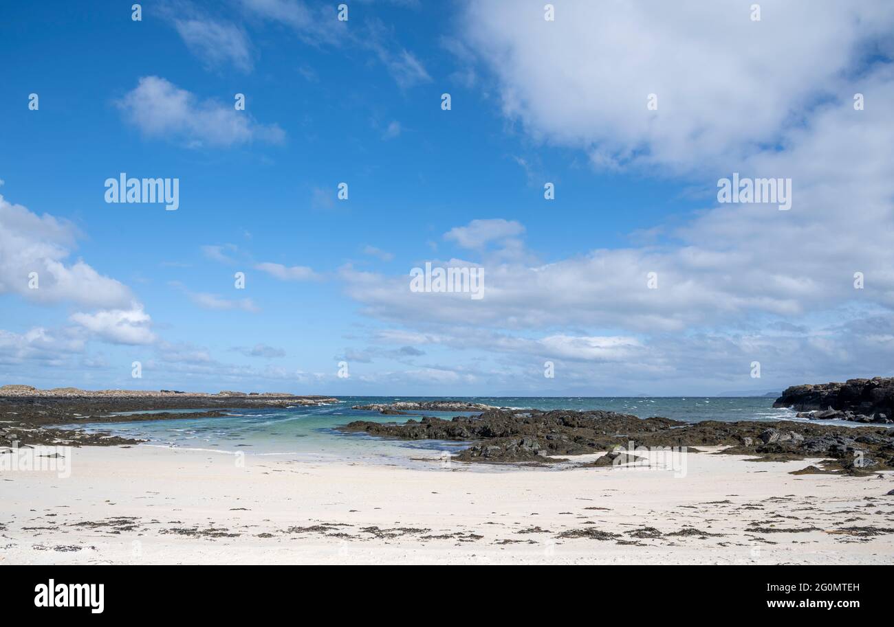 Port na Ba on the Isle of Mull, with the islands of Rhum, Eigg Skye and ...