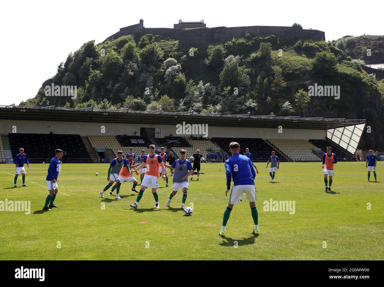 Northern Ireland players warm up on the pitch ahead of the ...
