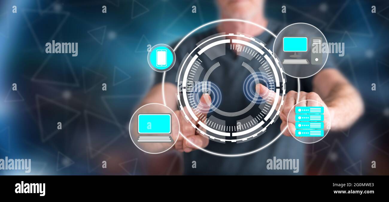 Man touching devices connection concept on a touch screen with his ...