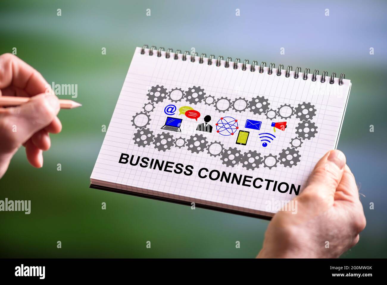 Hand drawing business connection concept on a notepad Stock Photo - Alamy