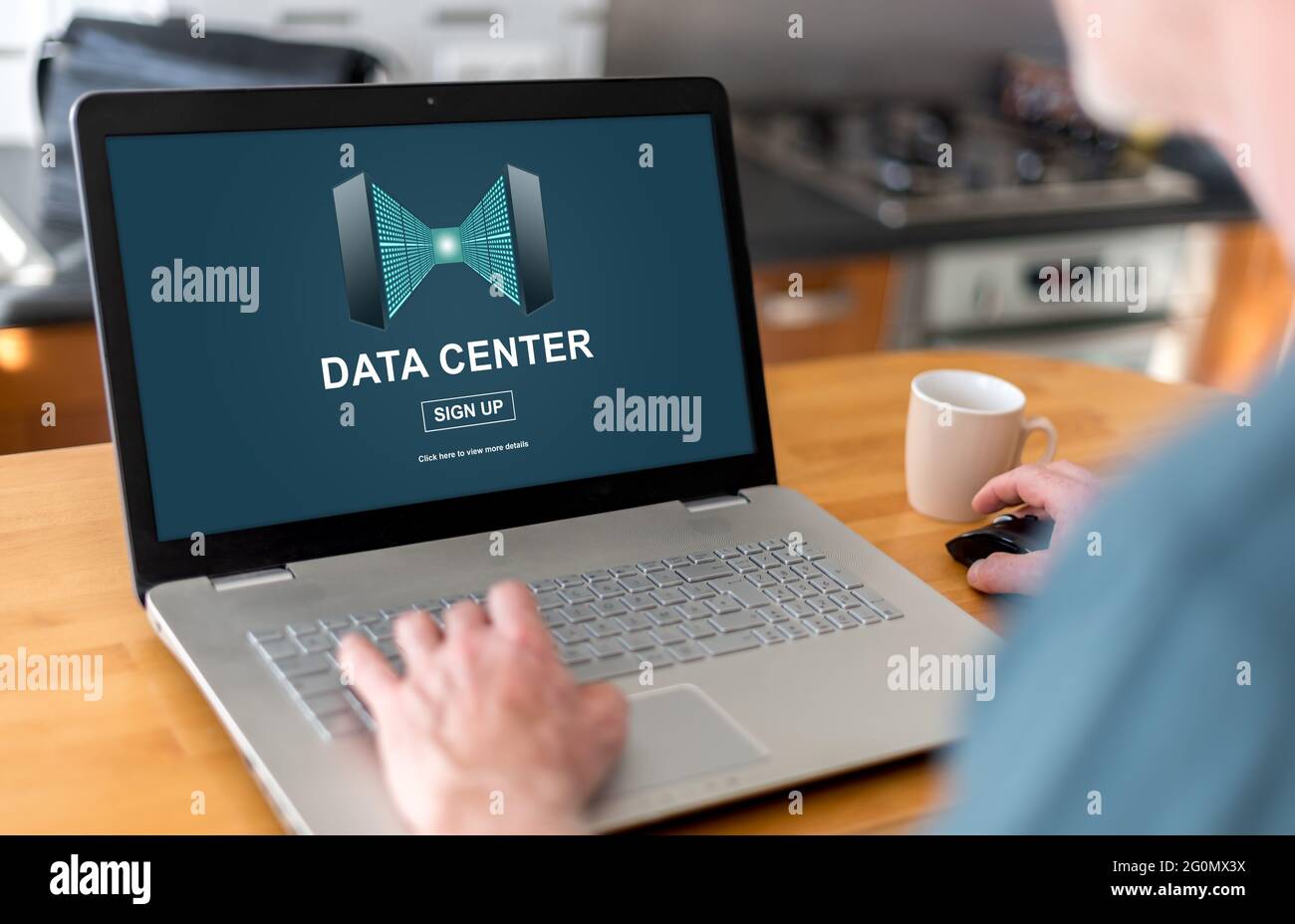 Man using a laptop with data center concept on the screen Stock Photo ...