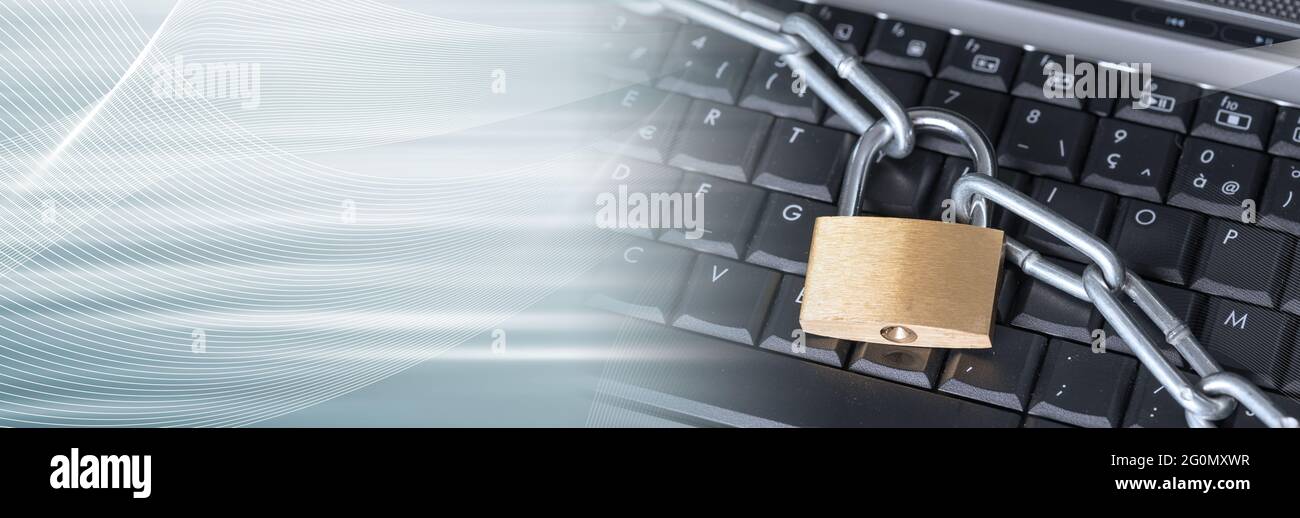 Computer security concept with a padlock and a chain on a keyboard. panoramic banner Stock Photo ...
