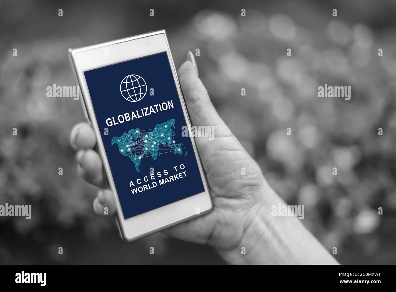 Female hand holding a smartphone with globalization concept Stock Photo ...