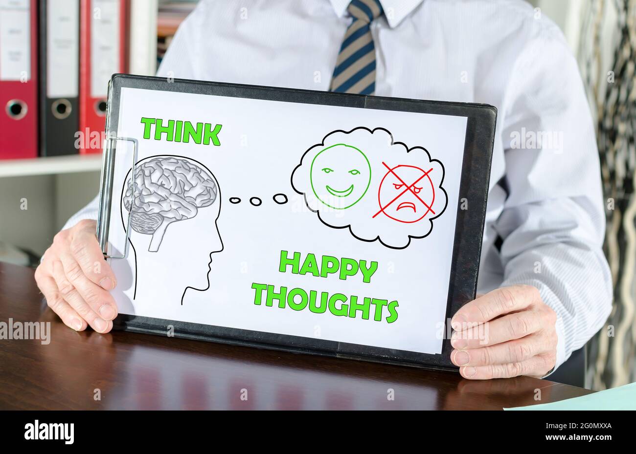 Happy thoughts concept shown by a businessman Stock Photo - Alamy