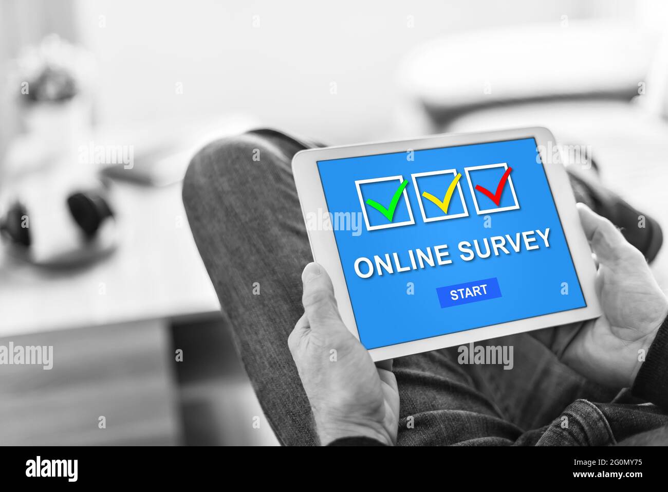 Tablet screen displaying an online survey concept Stock Photo - Alamy