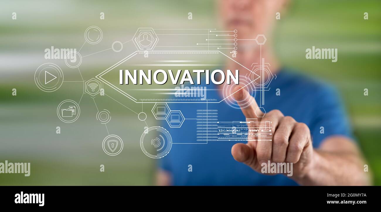Man touching an innovation concept on a touch screen with his finger ...