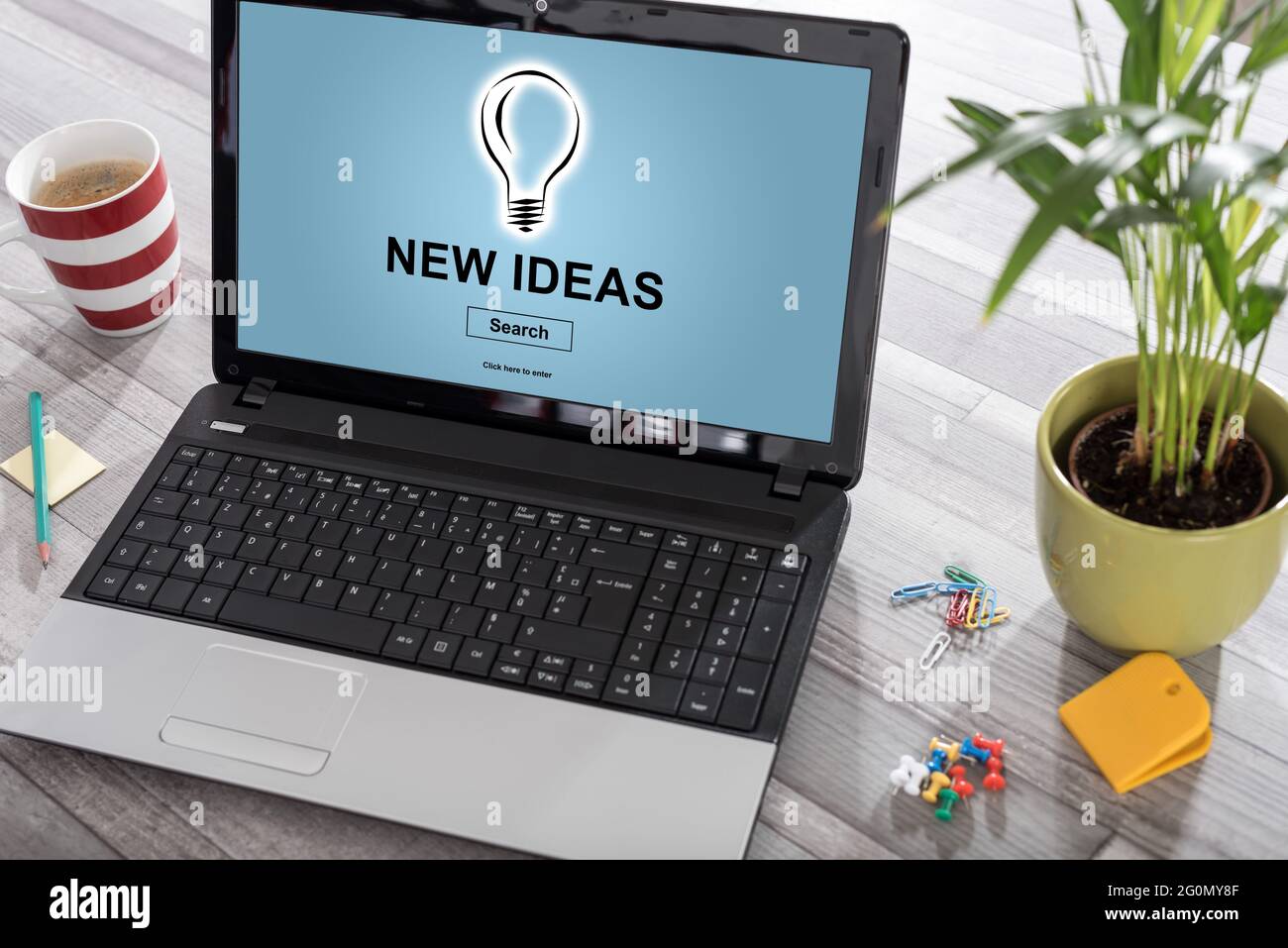 Laptop on a desk with new ideas concept on the screen Stock Photo - Alamy