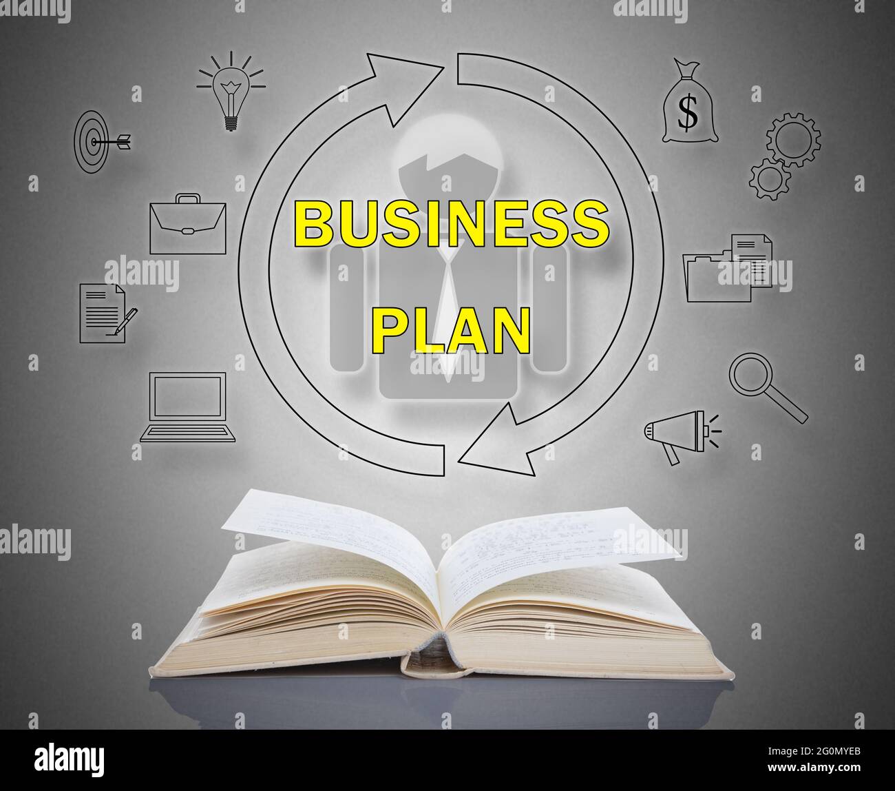Business plan concept above an open book Stock Photo - Alamy