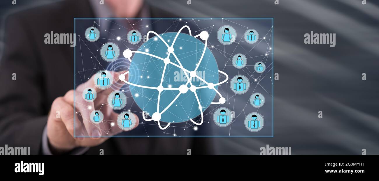 Man touching a global social network concept on a touch screen with his ...