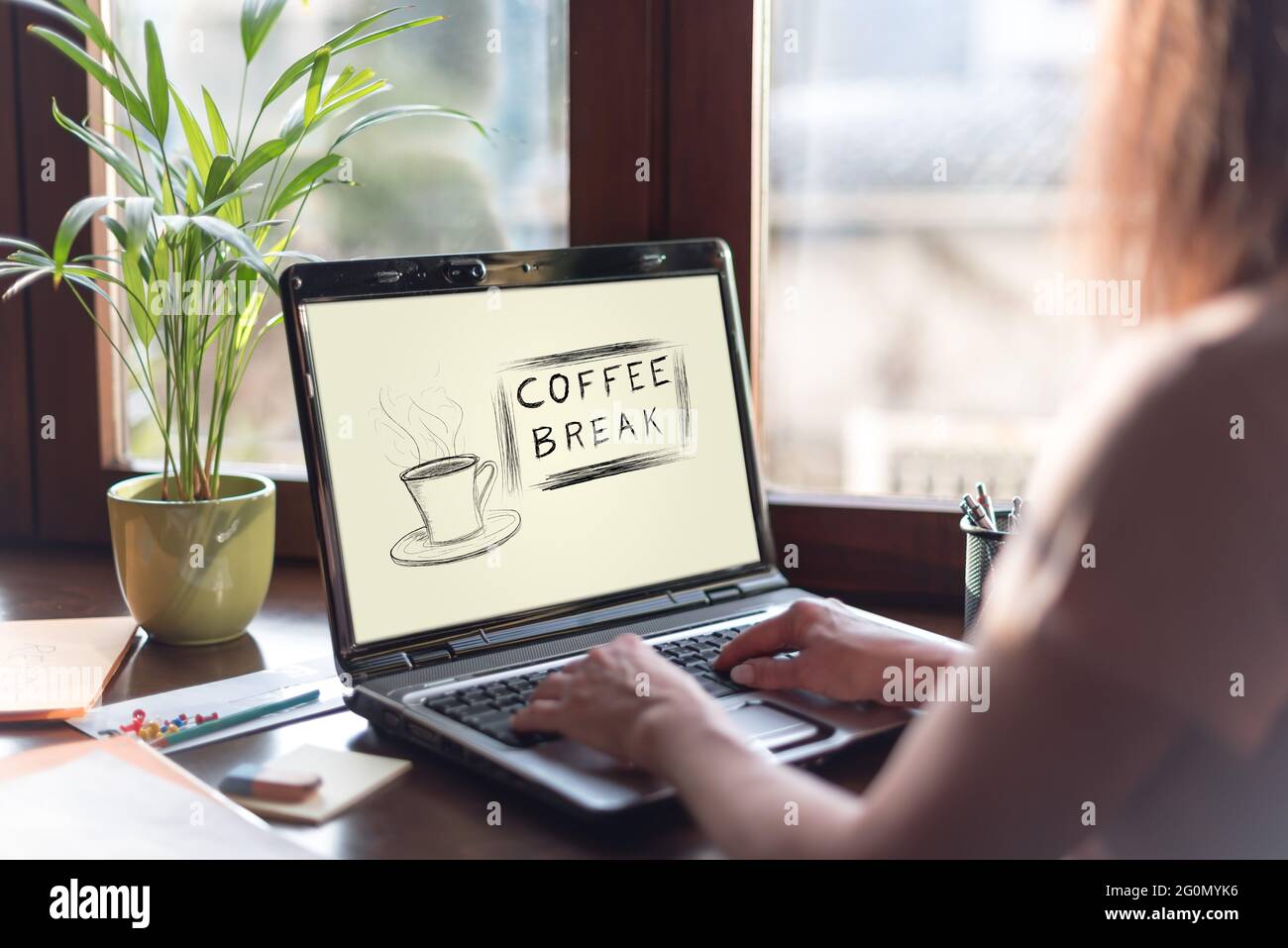Laptop screen displaying a coffee break concept Stock Photo - Alamy