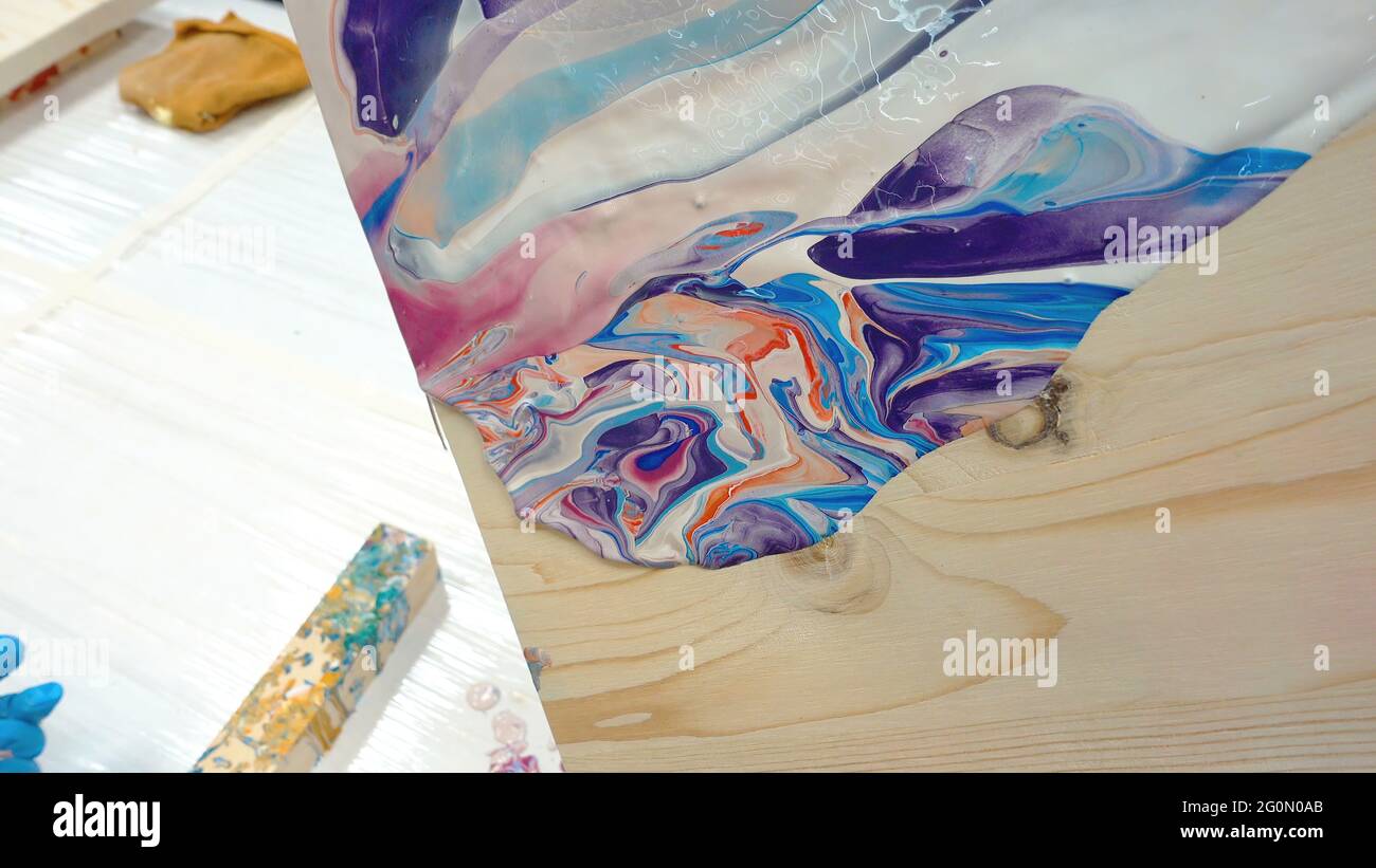 Photo of drawing picture in art fluid method Stock Photo - Alamy