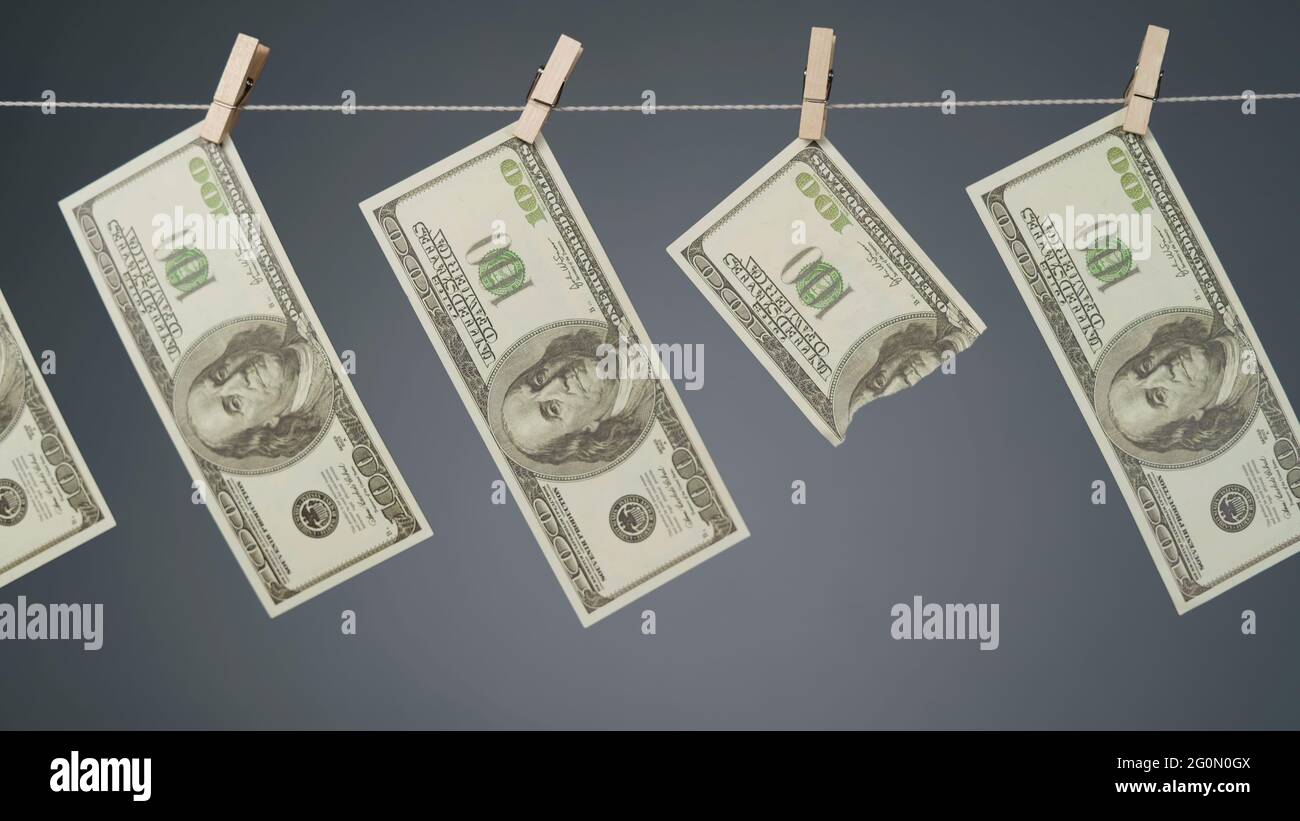 Image of money hanging on clothesline rope Stock Photo - Alamy
