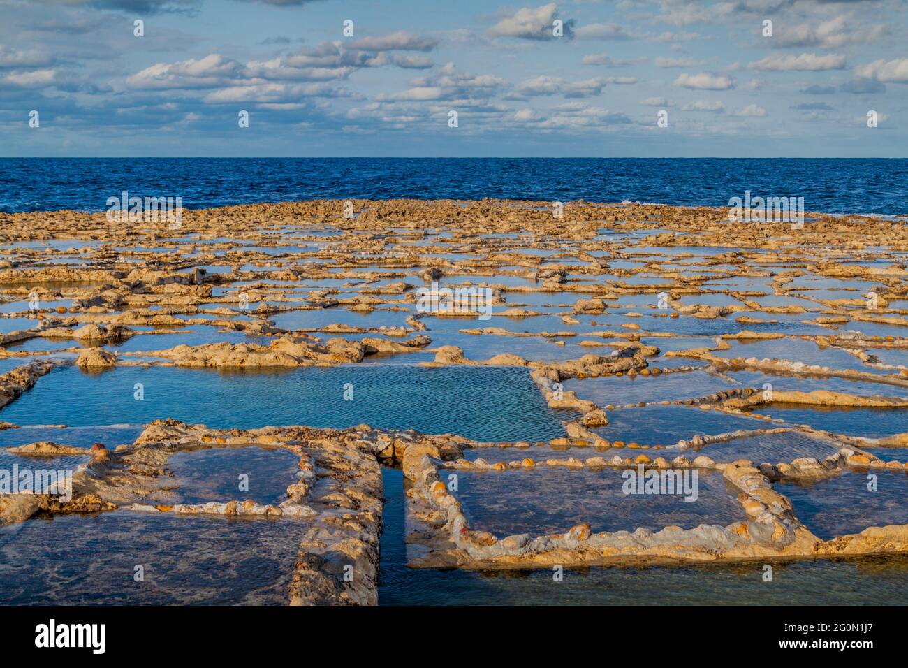 Salt pans on Gozo island in Malta Stock Photo - Alamy