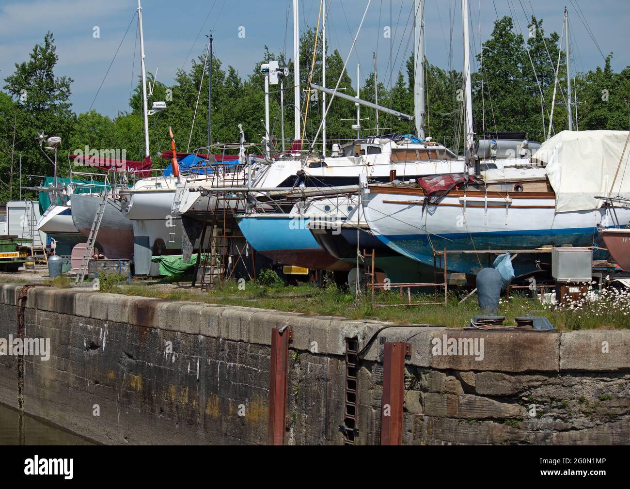 Boats in a line Stock Photo - Alamy