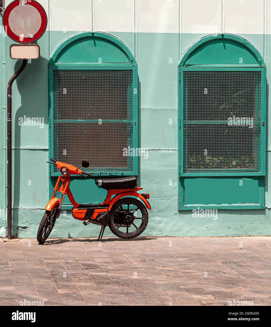 Orange retro motorcycle Stock Photo - Alamy
