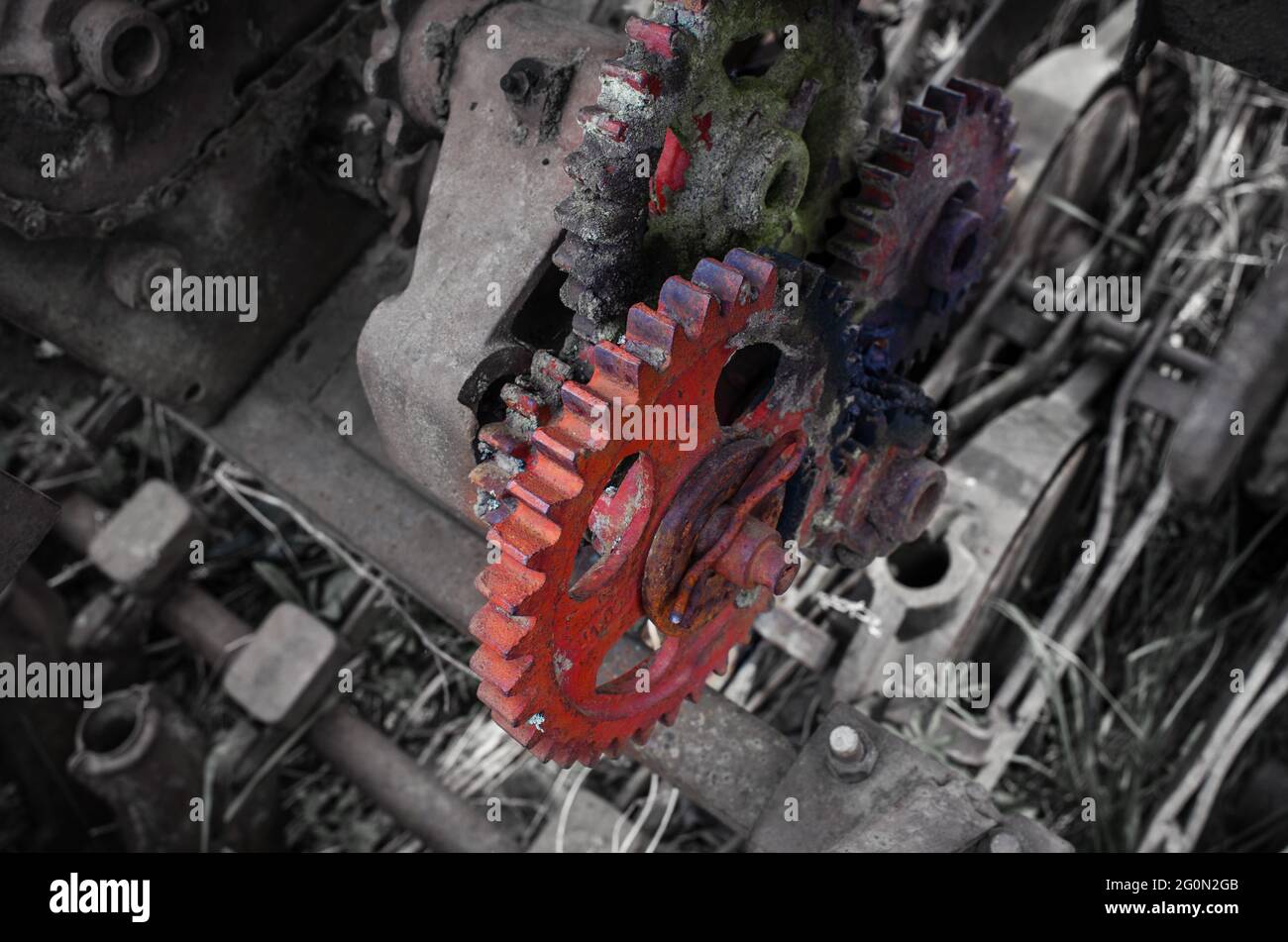 Rusty old metal gears in broken combine unit. Remains of the old ...