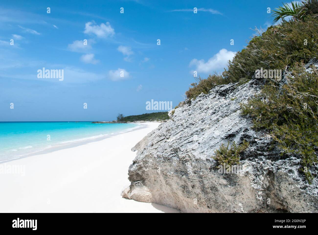 The scenic view a rocky landscape and sandy beach on Half Moon Cay ...