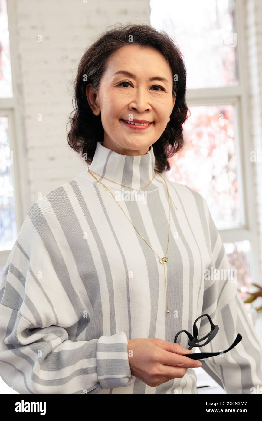 Elegant and confident business elderly ladies Stock Photo - Alamy