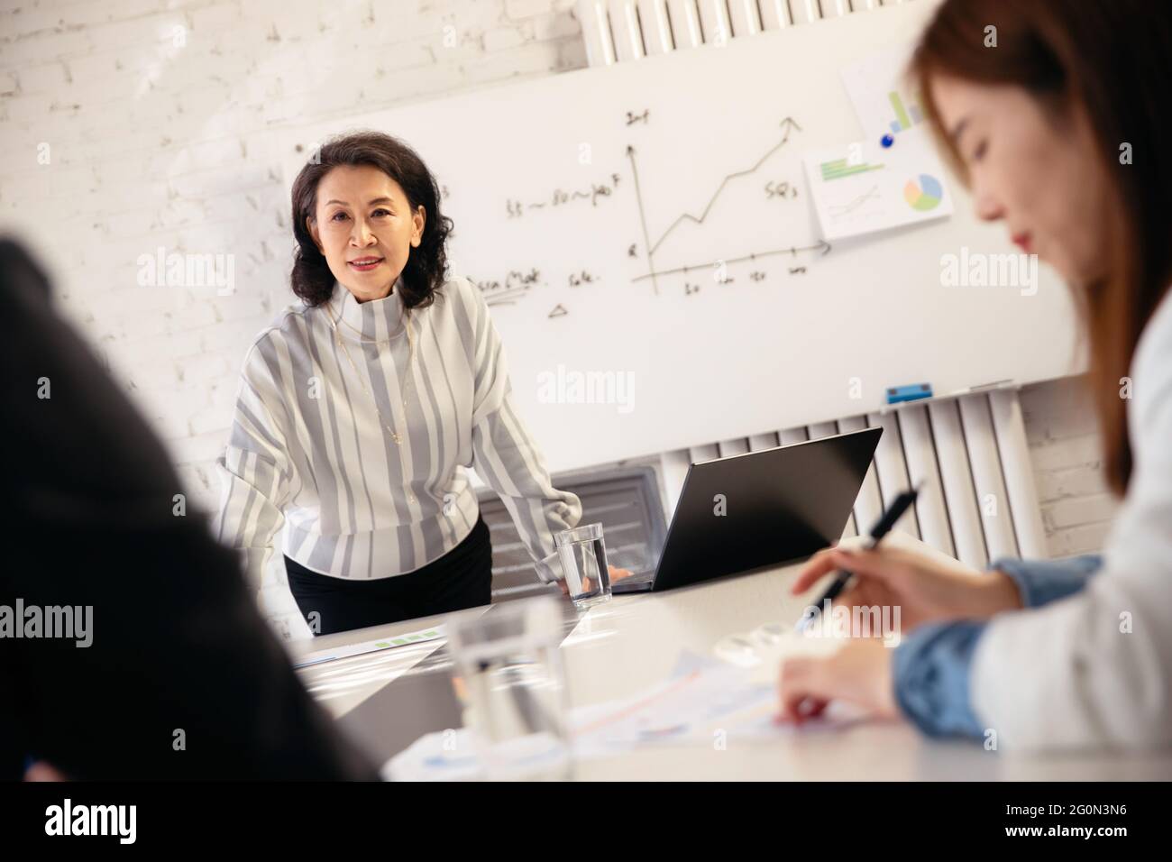 Business elderly ladies preside over the meeting Stock Photo - Alamy