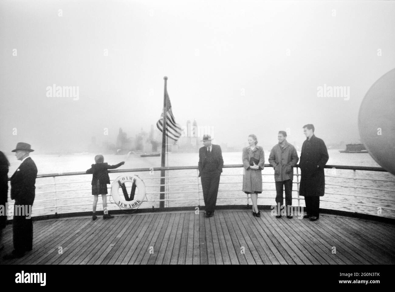 Group of People on deck of S.S. Coamo leaving New York Harbor, New York ...